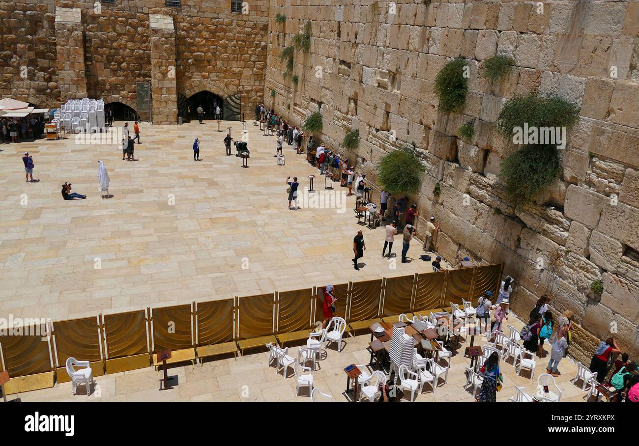 Jews pray at the Western Wall, (Wailing Wall, or Kotel), an ancient ...