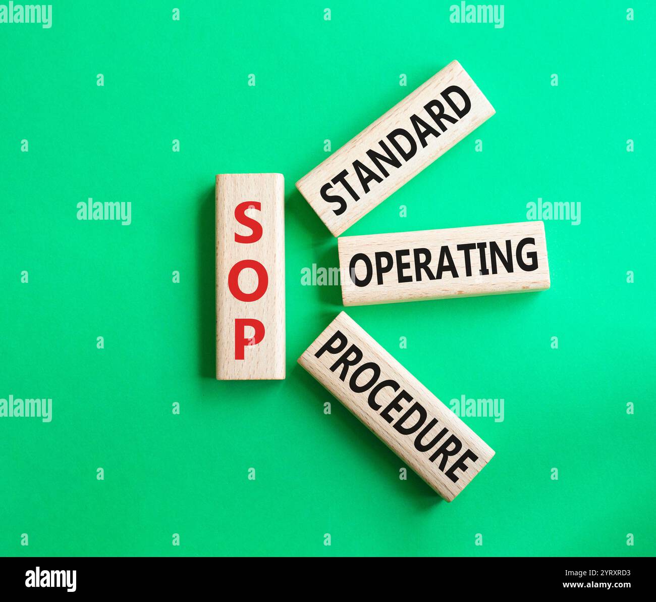 SOP - Standard Operating Procedure symbol. Wooden blocks with word SOP ...