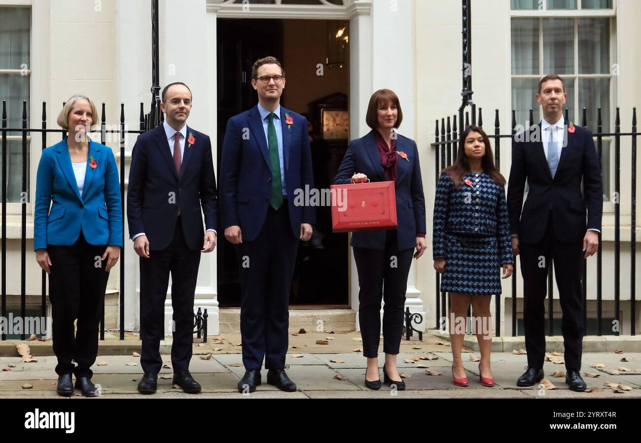 British treasury ministers leave 11 Downing Street to present the ...