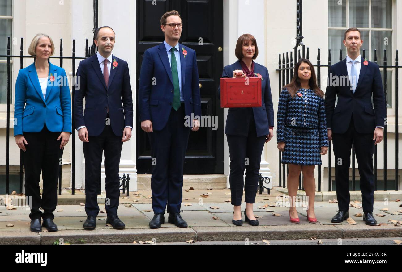 British treasury ministers leave 11 Downing Street to present the ...
