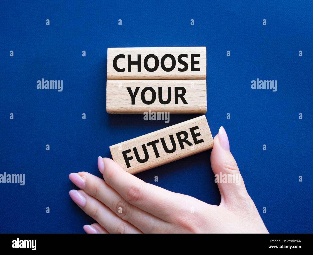 Choose your future symbol. Wooden blocks with words Choose your future ...