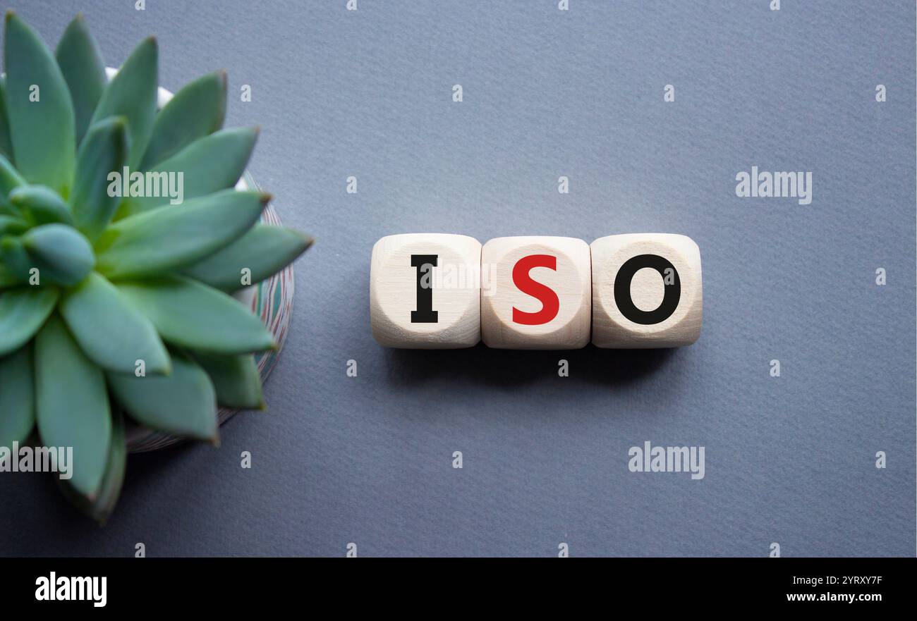 ISO standards quality control symbol. Concept word ISO on wooden cubes ...