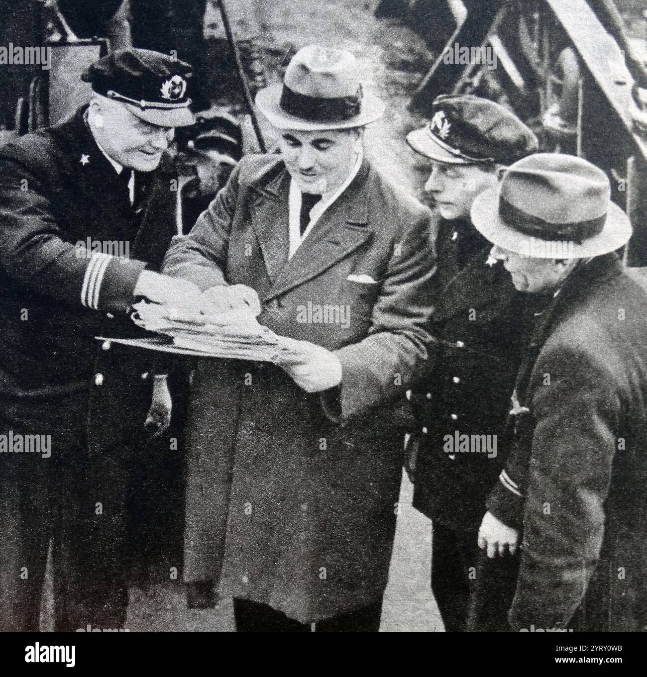World War II: A customs officer checks with officers of a newly-arrived ...