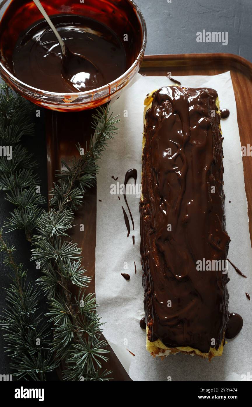 Buche de Noel. Traditional Christmas dessert. Preparing Christmas yule ...