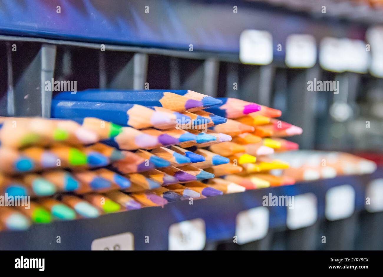 coloured pencils on a shelf in an art store Stock Photo - Alamy