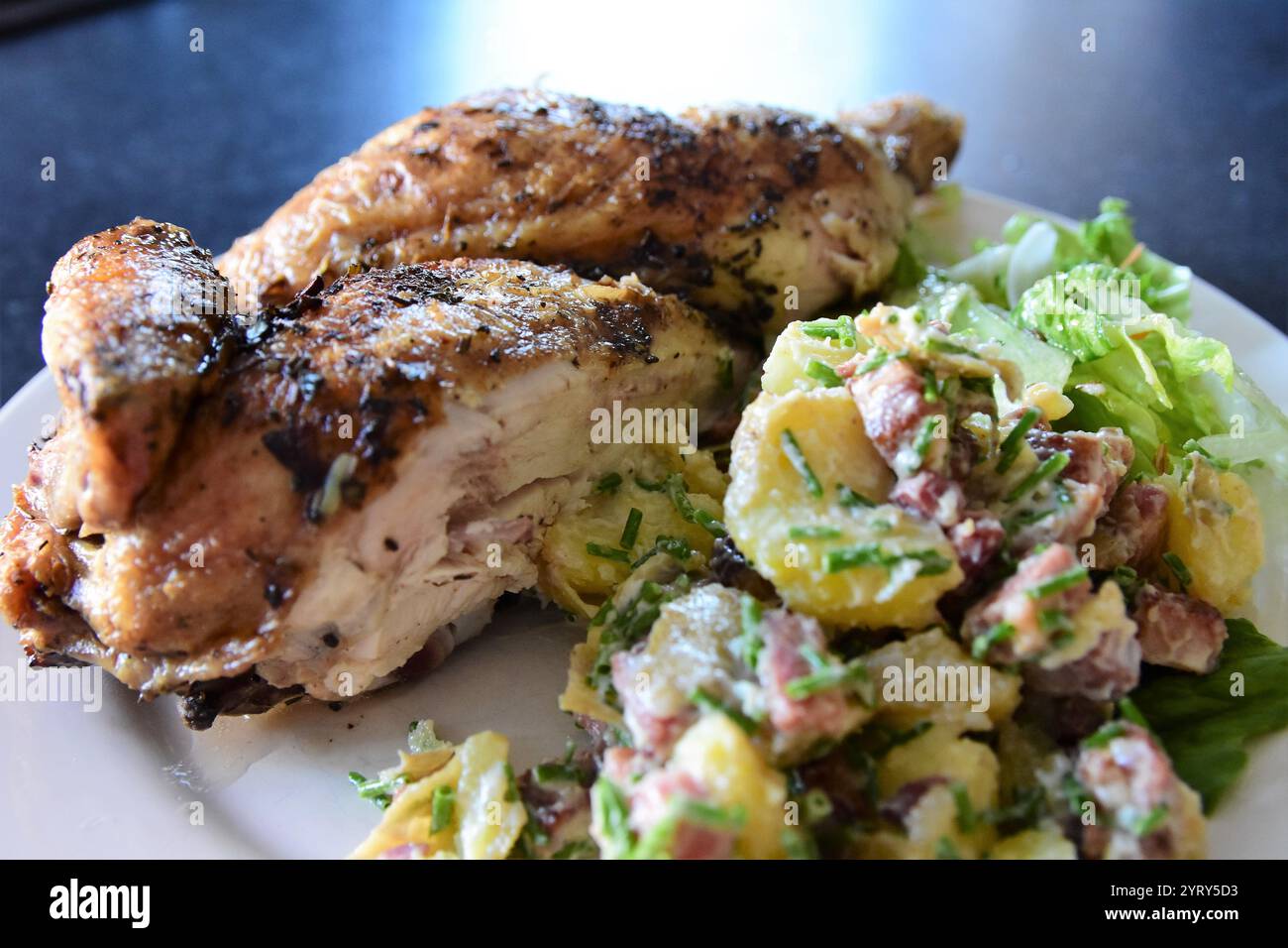 Roast Chicken With Potato Salad Stock Photo Alamy roast-chicken-with-potato-salad-stock-photo-alamy