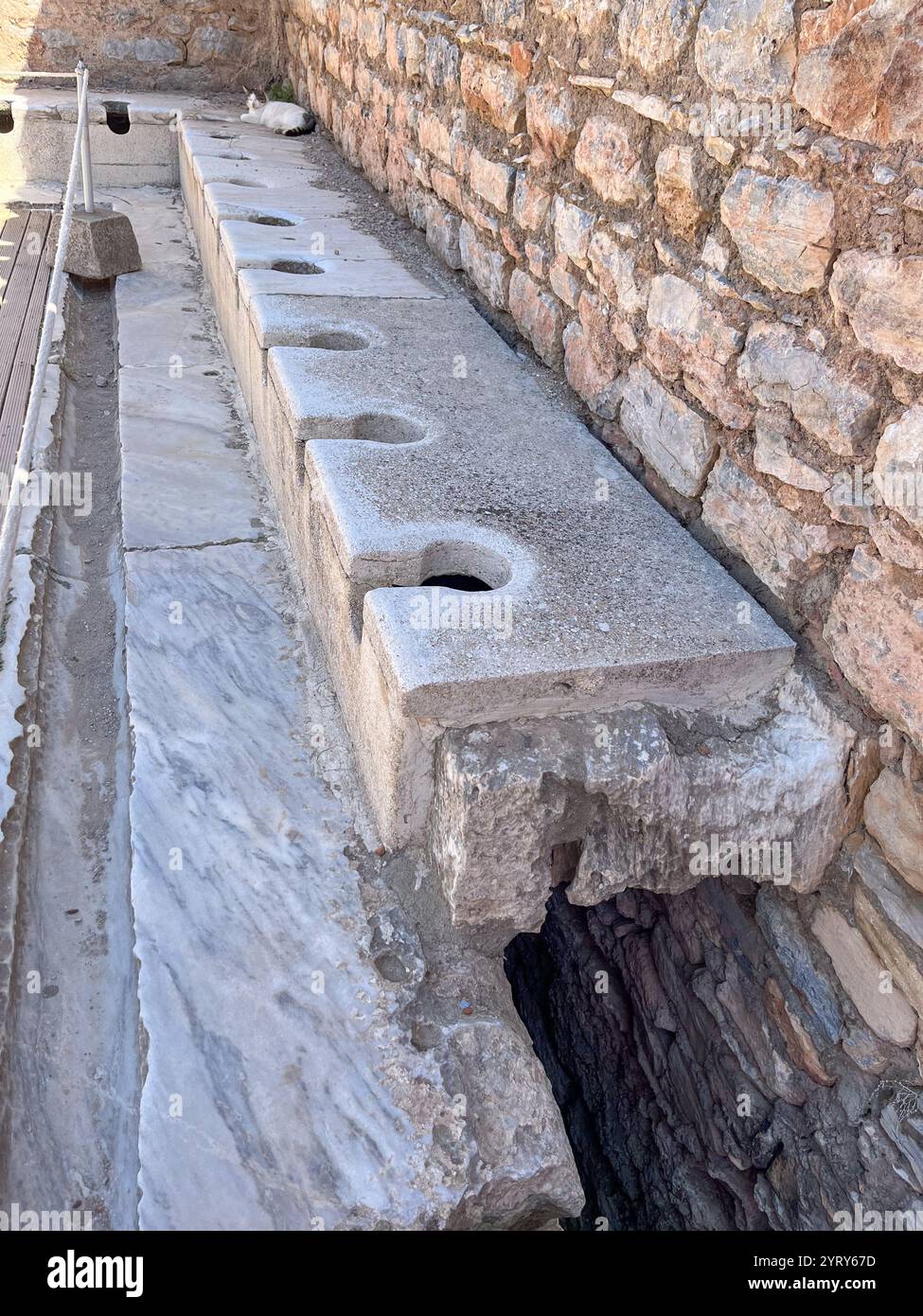 Latrine or public toilet at the archaeological site of Ephesus near ...