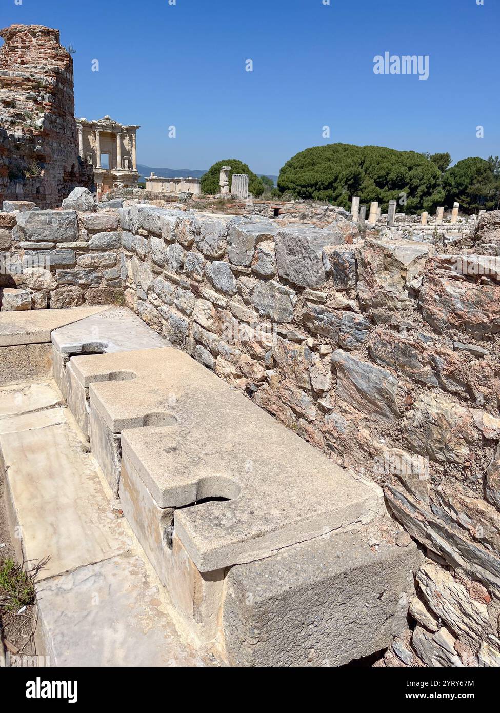 Latrine or public toilet at the archaeological site of Ephesus near ...