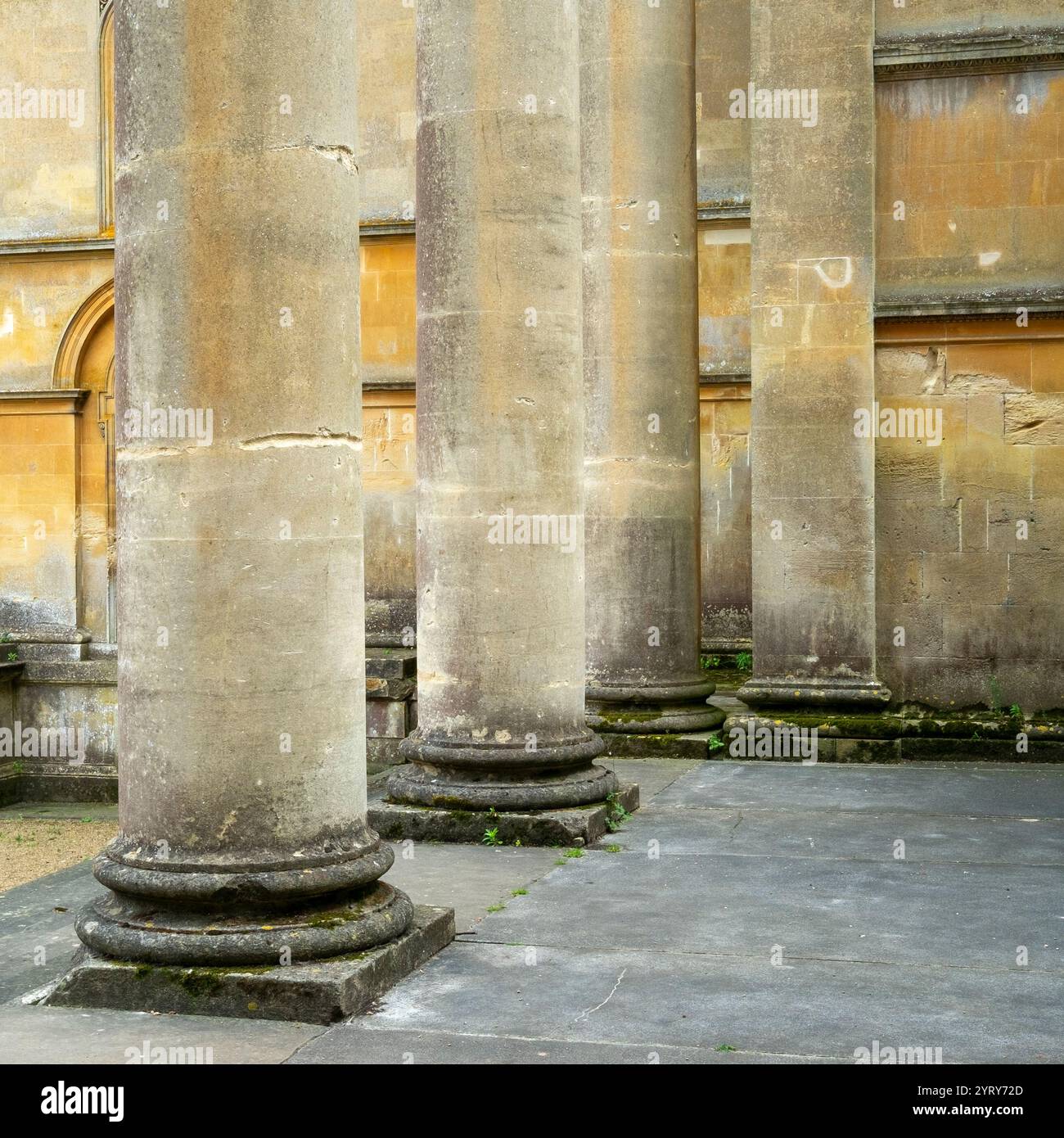 Classical architecture close up detail of old distressed stone columns ...