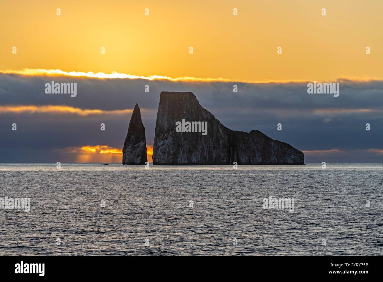 Kicker Rock formation by San Cristobal island at sunset, Galapagos ...