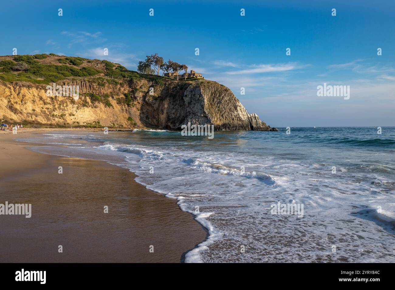 Crystal Cove Beach features soft waves and a scenic cliff backdrop in ...