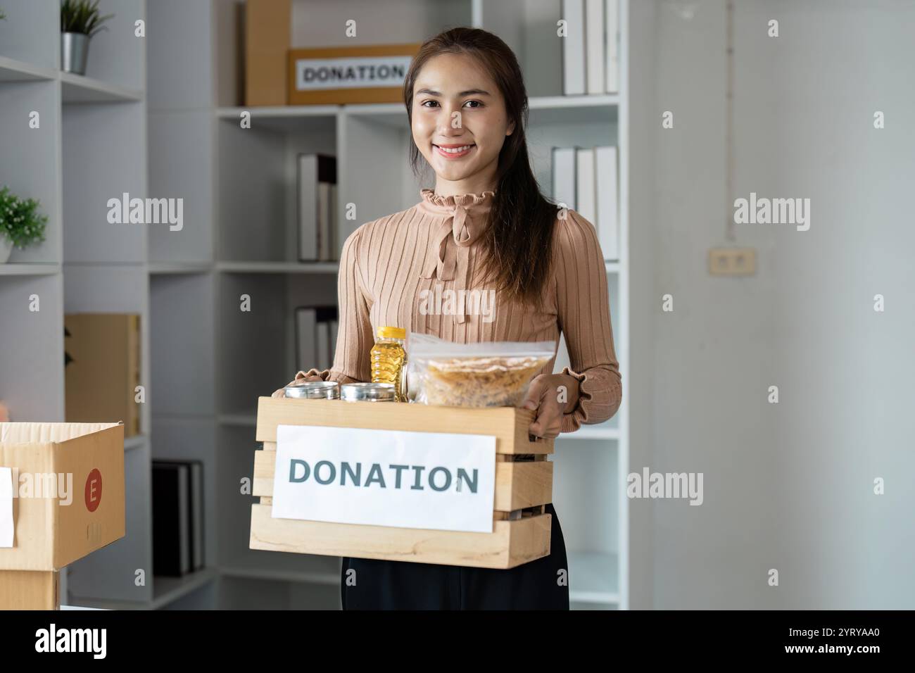 volunteer Assisting at Donation Centers and Food Banks Providing ...