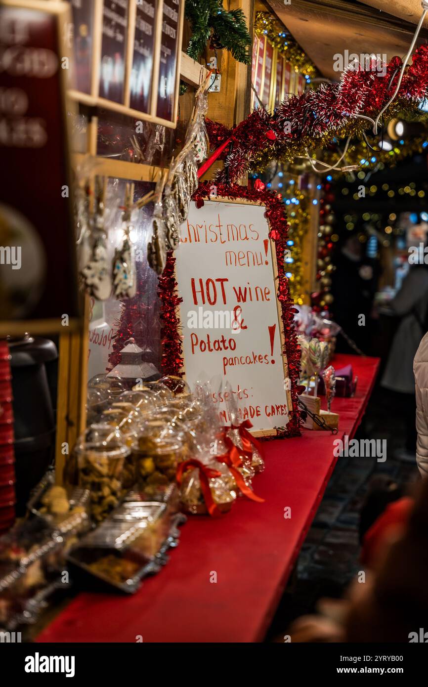 Christmas market stall with festive menu and treats Stock Photo - Alamy