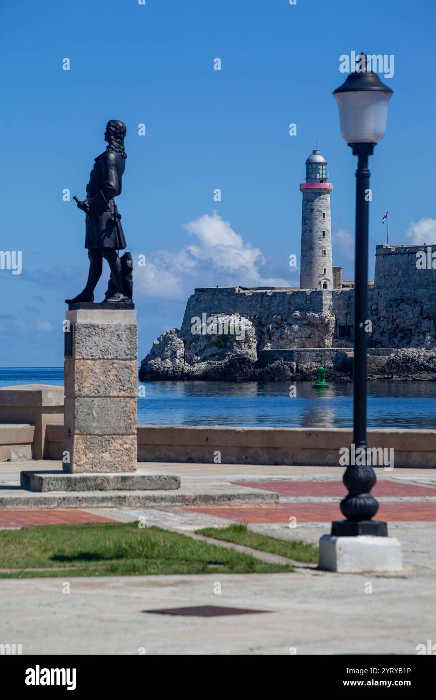 The Pierre le Moyne dIberville statue and the lighthouse of Castillo ...