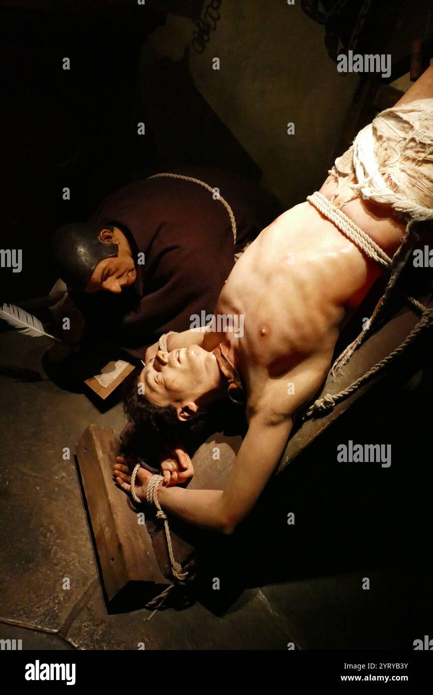 Waxwork figure of a heretic tortured by the (French) Inquisition. The Inquisition was a group of ...