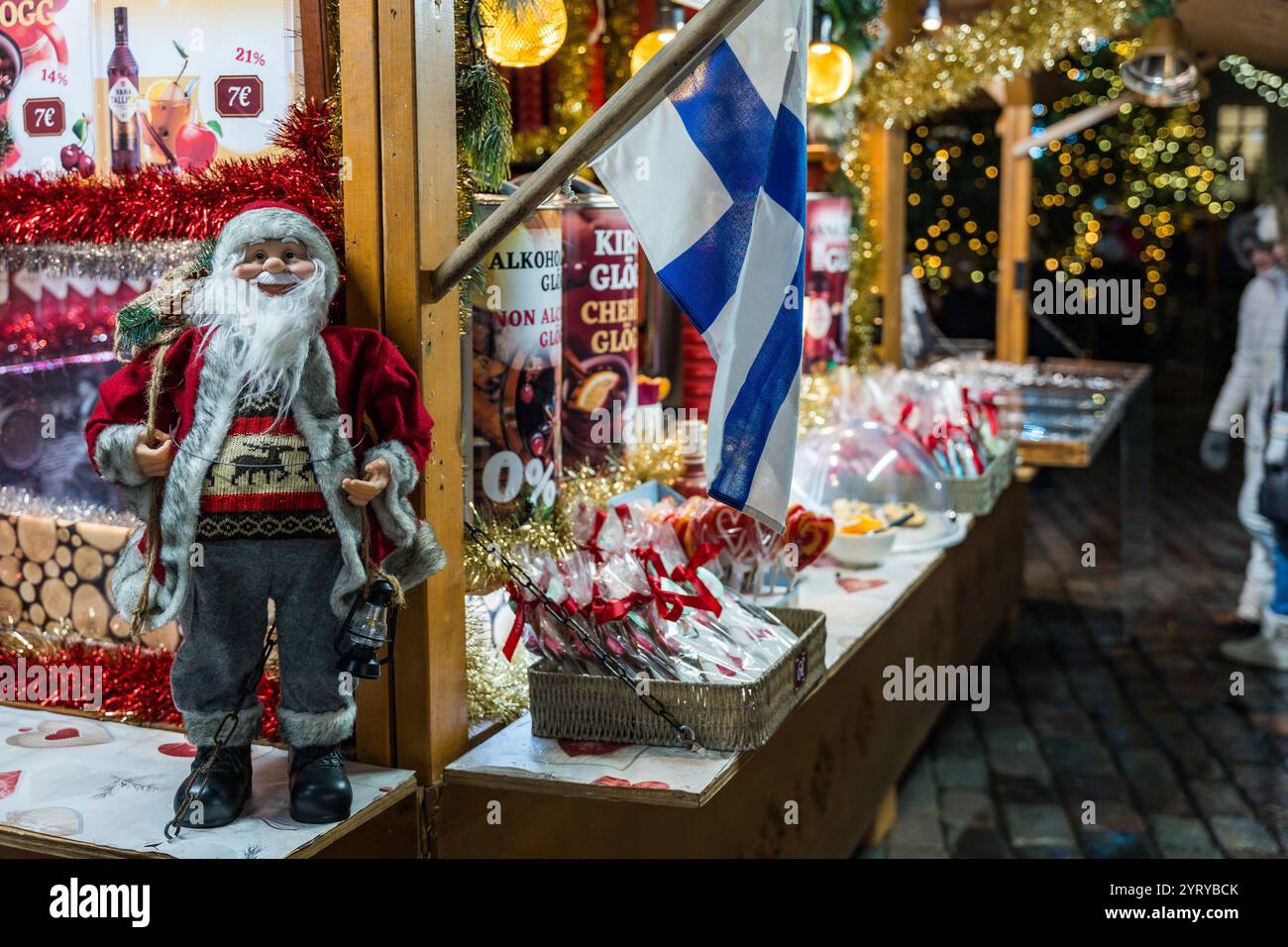 Christmas market stall with Santa figurine and Finnish flag Stock Photo ...
