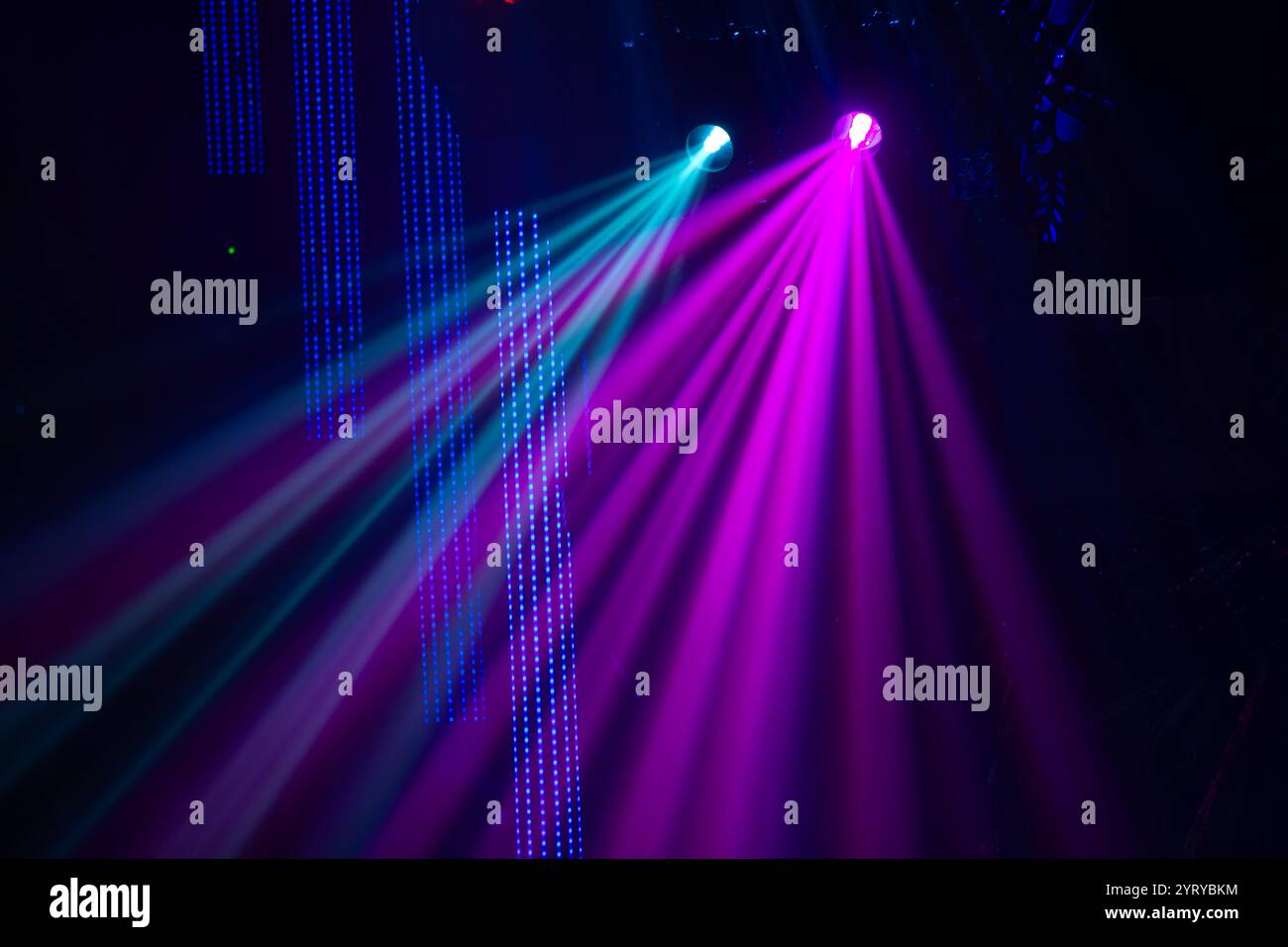 Multi-colored laser beams from stage spotlights Stock Photo - Alamy
