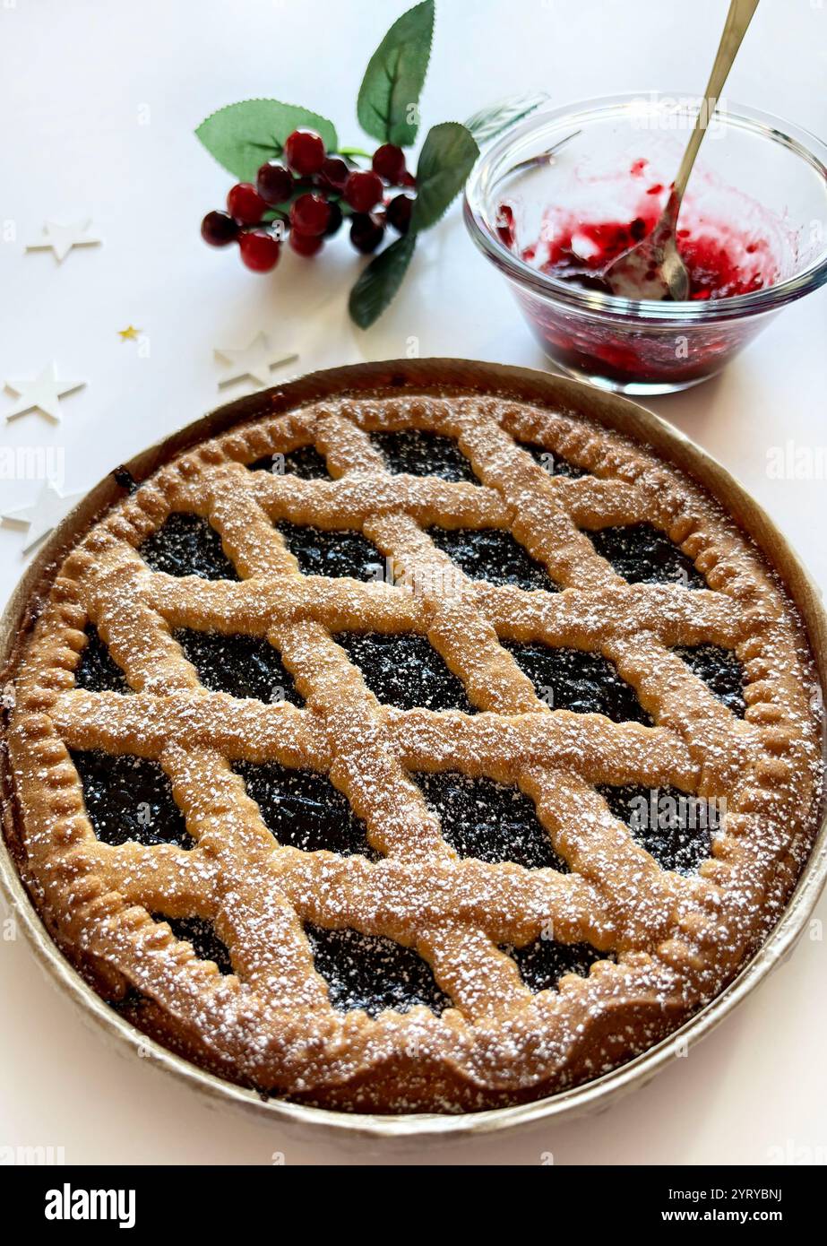 Homemade Christmas tart with jam on a white background. Linzer tart ...