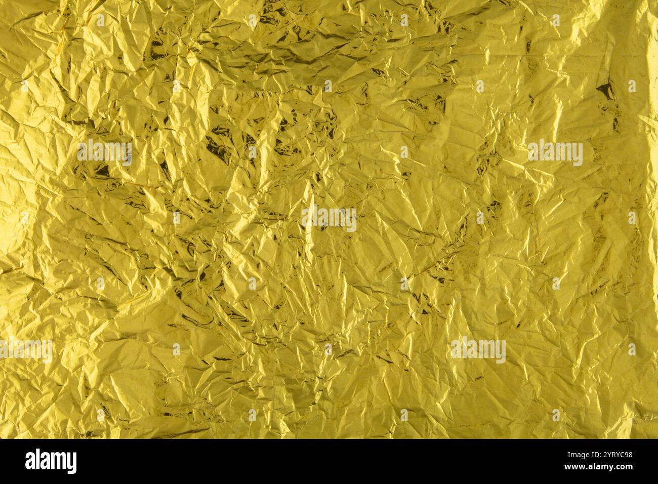 Texture of crumpled gold foil paper Stock Photo - Alamy