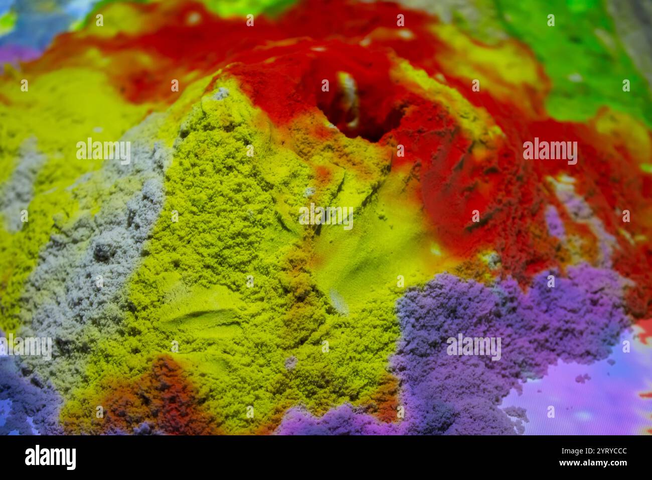 Yellow kinetic sand toy hi-res stock photography and images - Alamy