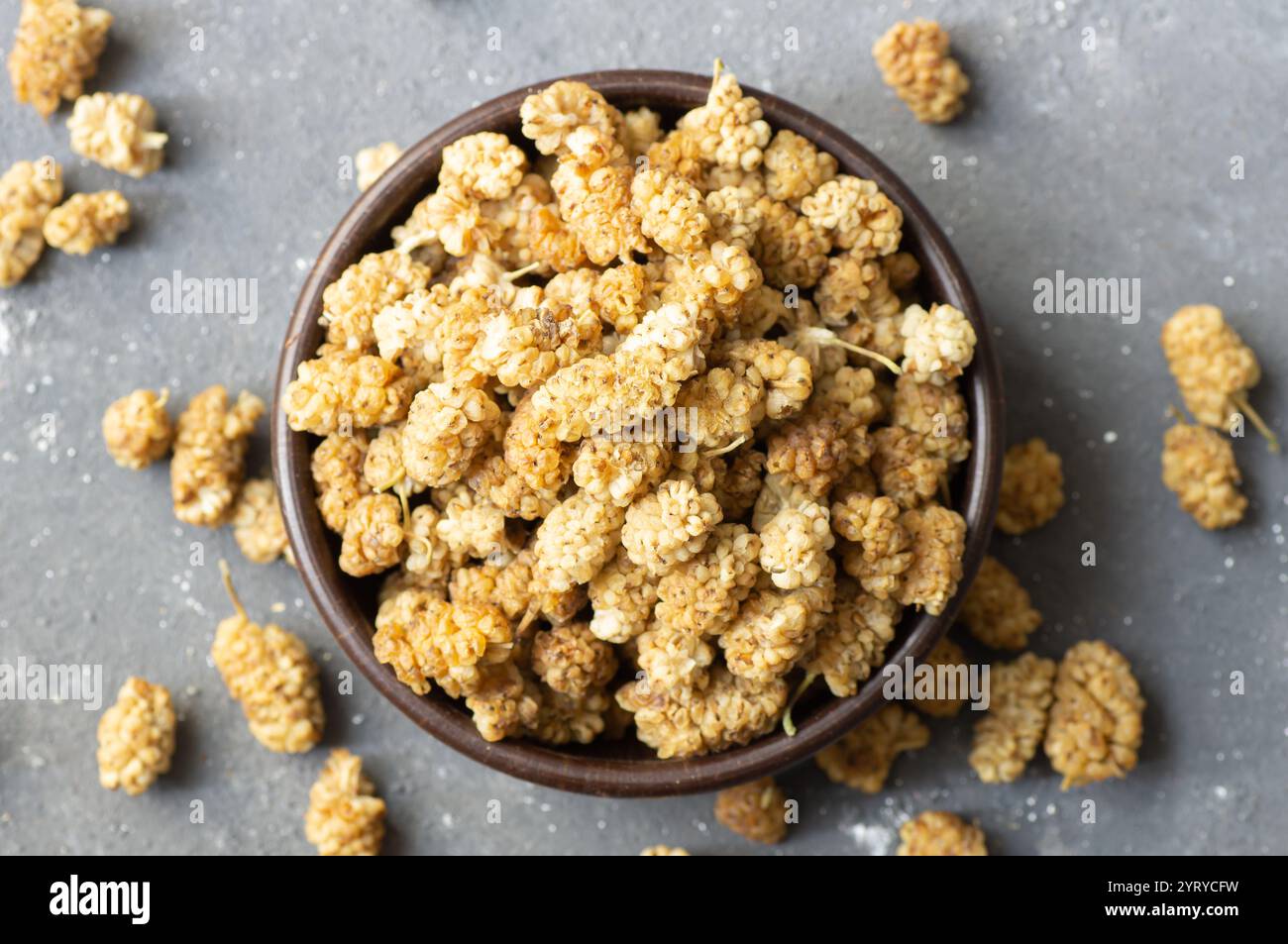 Dried white Mulberry fruits on rustic background, healthy snack fruit ...