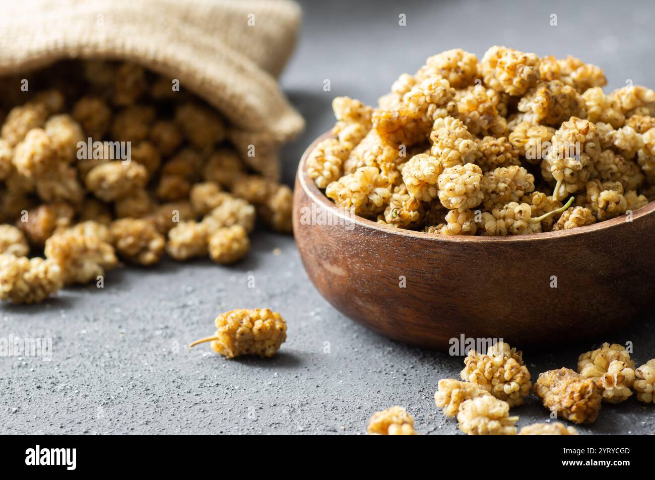 Dried white Mulberry fruits on rustic background, healthy snack fruit ...