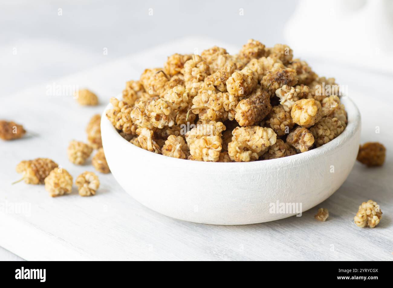 Dried white Mulberry fruits on rustic background, healthy snack fruit ...