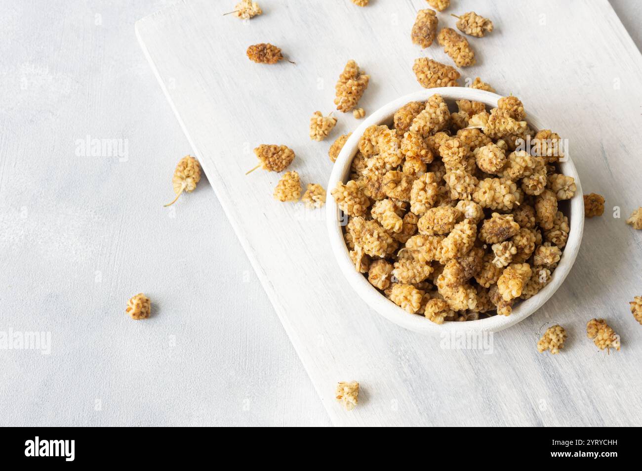 Dried white Mulberry fruits on rustic background, healthy snack fruit ...