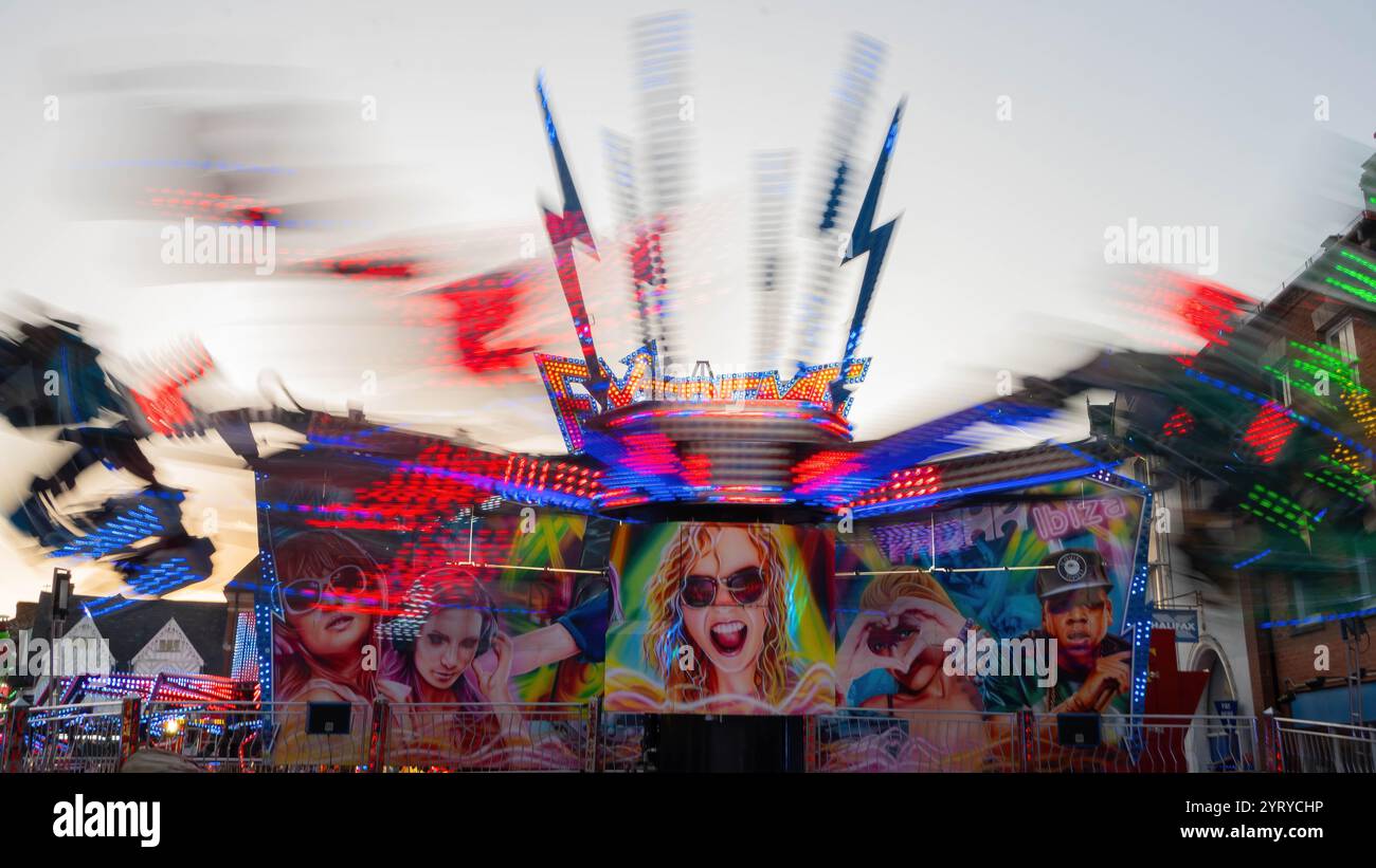 A long-exposure image of a whirling funfair ride Stock Photo - Alamy