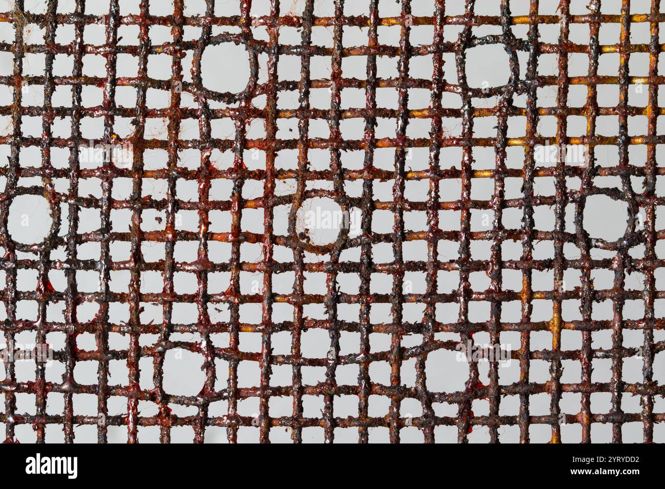 Rusty and damaged metal mesh creating a textured background ...