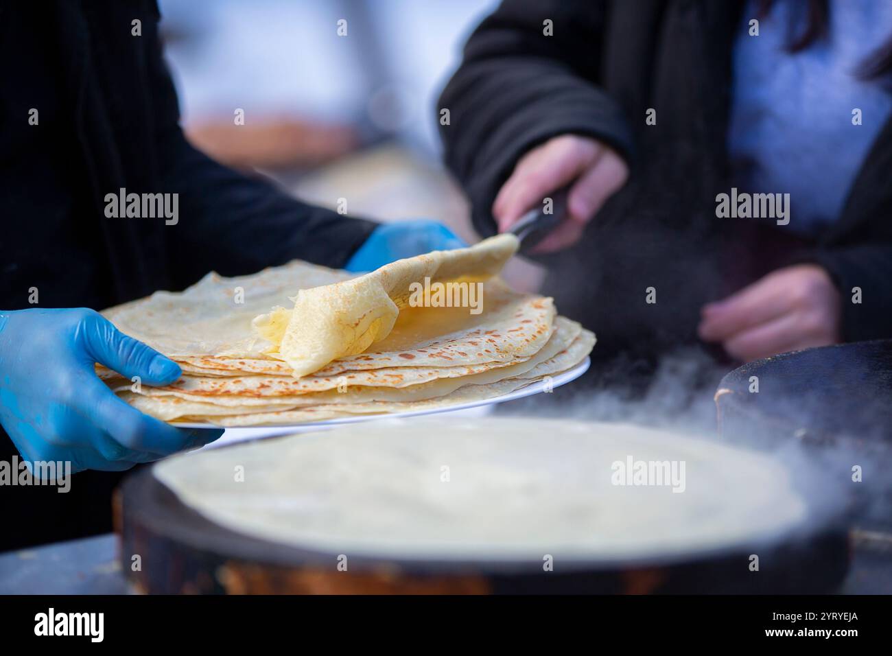 Street food. Fried pancakes in a street cafe Stock Photo - Alamy
