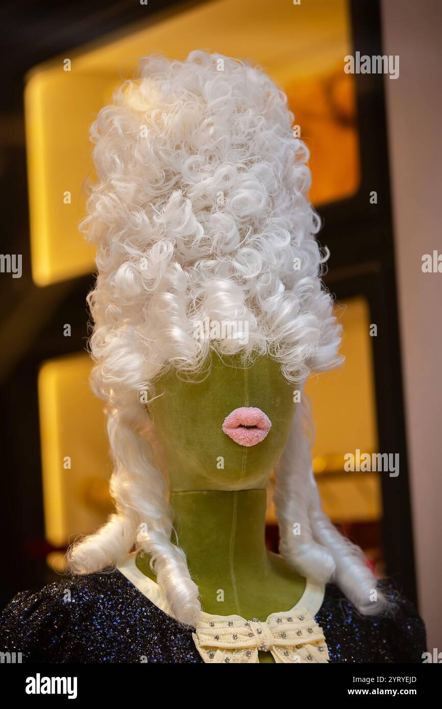 Extravagant creative female mannequin with a strange hairstyle in ...