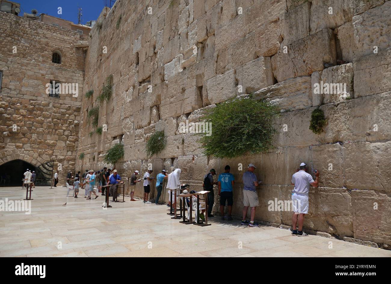 Jews pray at the Western Wall, (Wailing Wall, or Kotel), an ancient ...