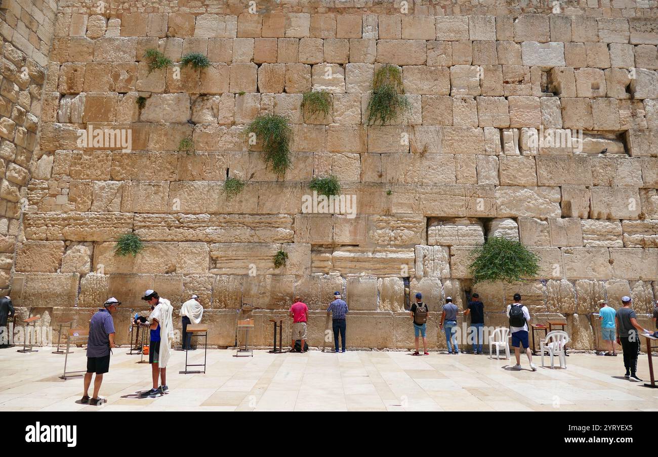 Jews putting on Tefillin during prayers at the Western Wall, (Wailing ...