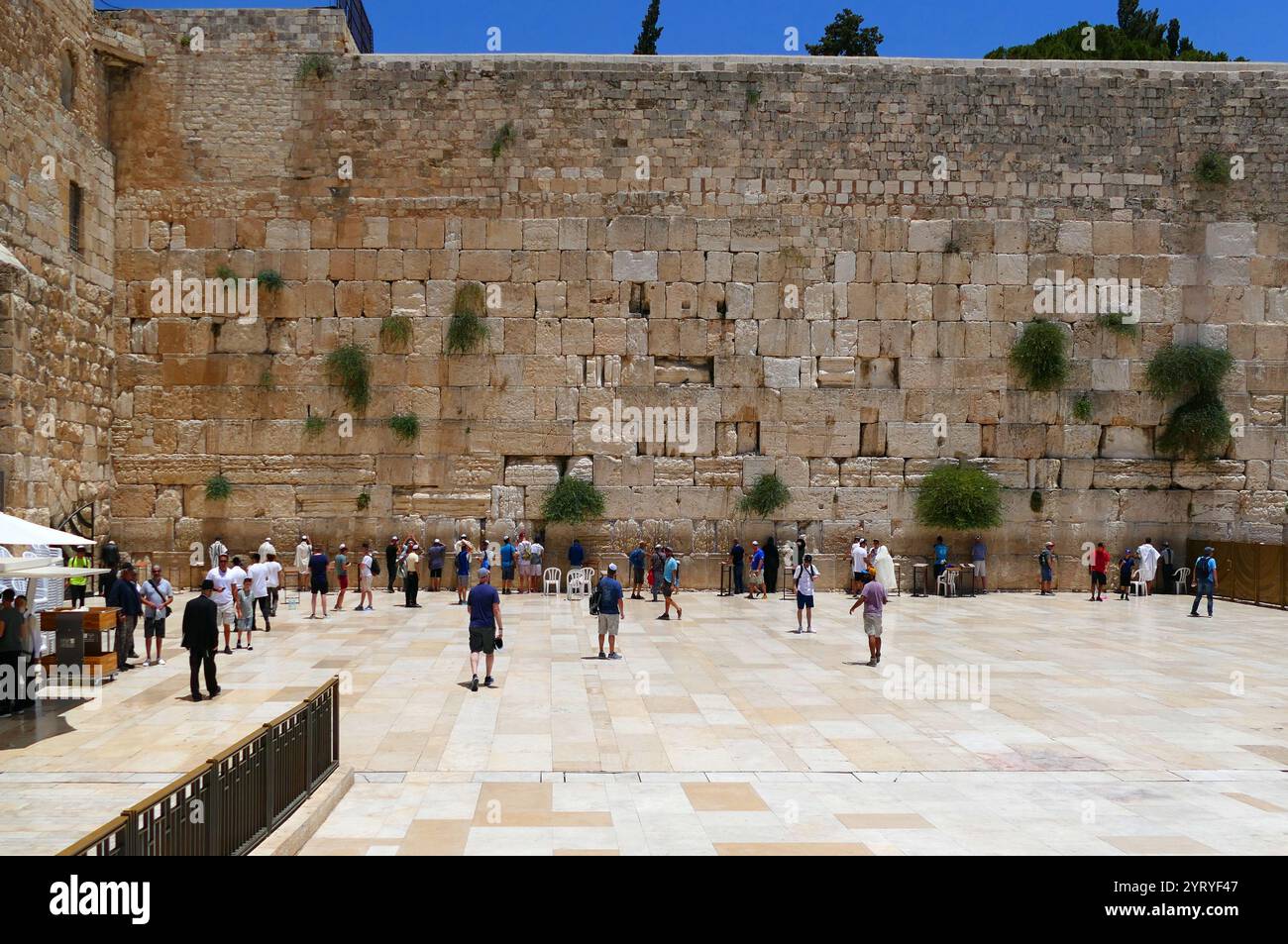 Jews pray at the Western Wall, (Wailing Wall, or Kotel), an ancient ...