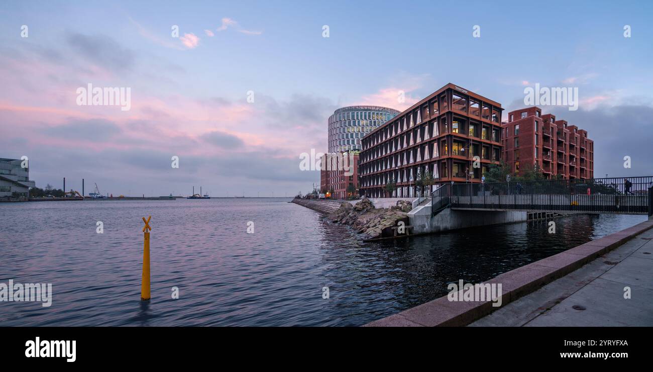 Copenhagen, Denmark - Porten office building by Henning Larsen, at dusk ...
