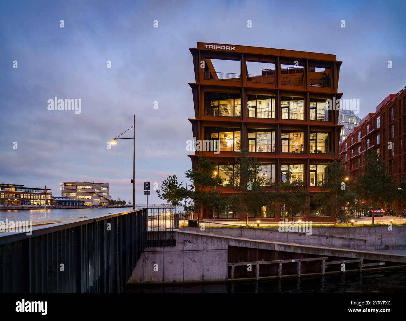 Copenhagen, Denmark - Porten office building by Henning Larsen, at dusk ...