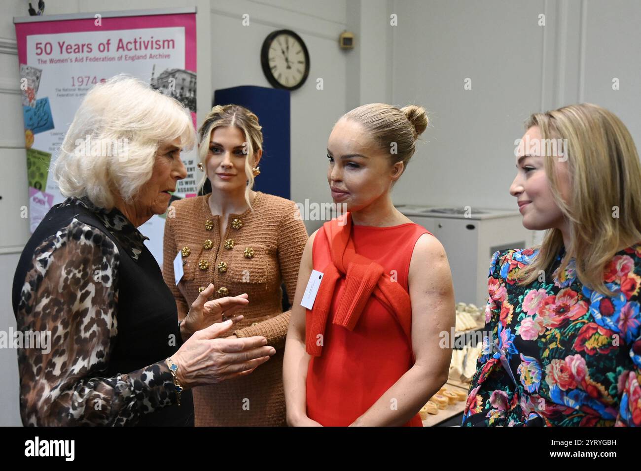 Queen Camilla speaks to (left to right) Ashley James, Katie Piper and ...