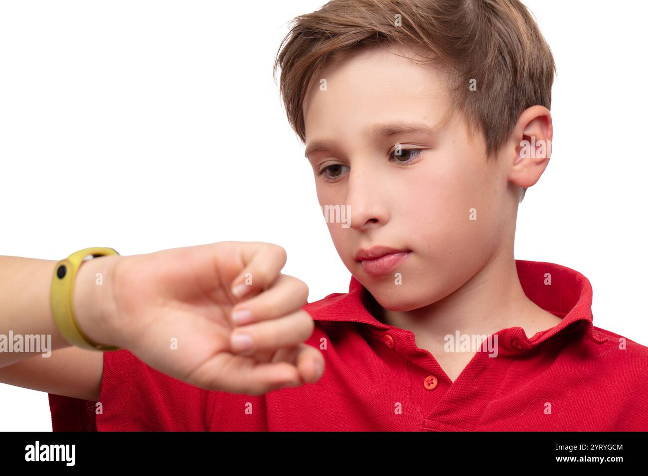 A teenage boy watches the time on his watch in close-up Stock Photo - Alamy