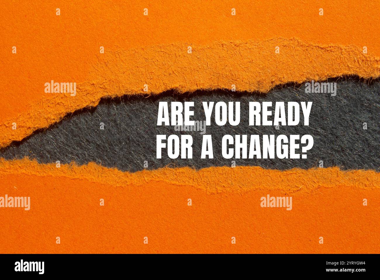 Are you ready for a change message written on ripped torn orange paper ...