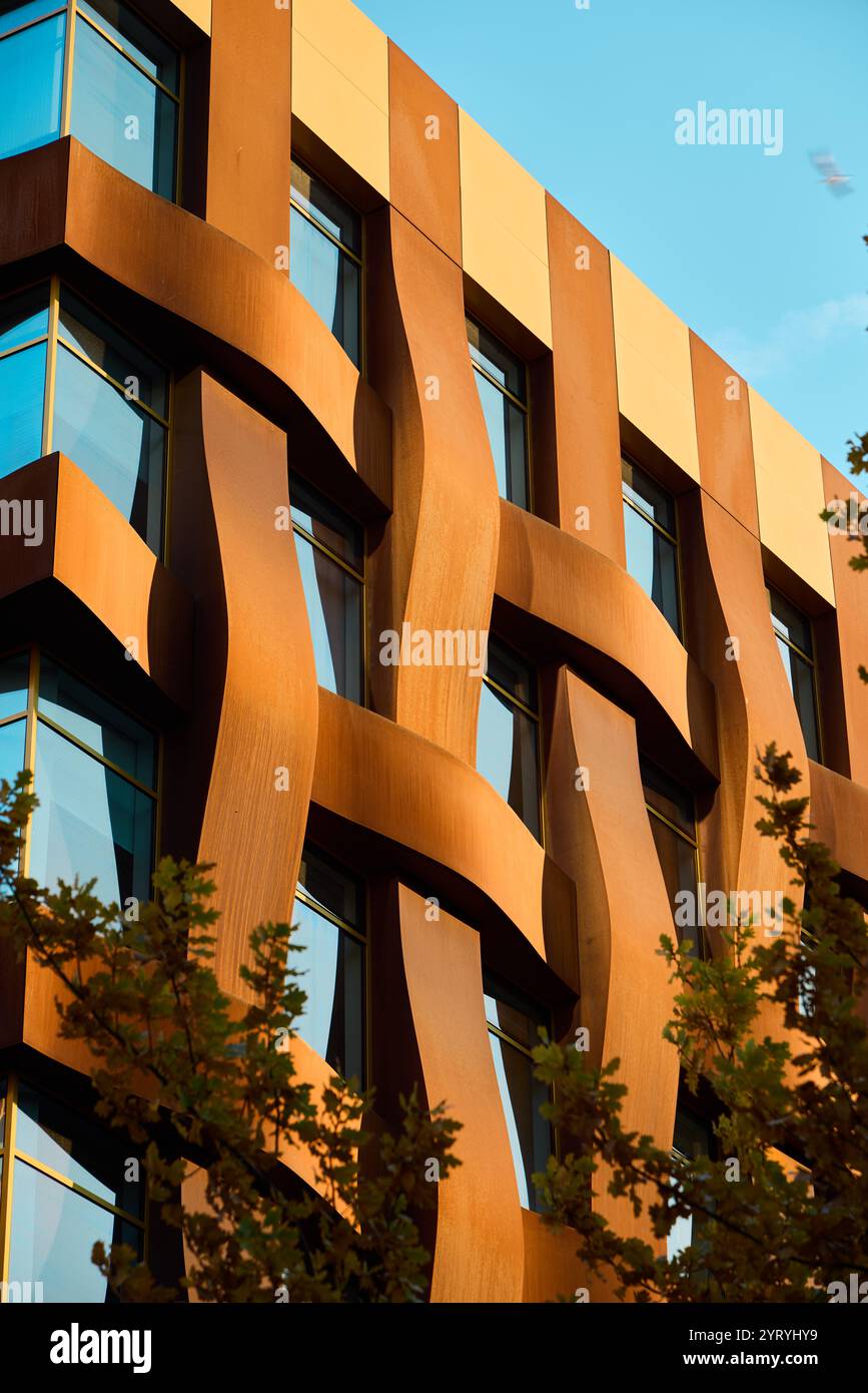 An Innovative Building Facade Featuring a Wavy Design and Contemporary ...