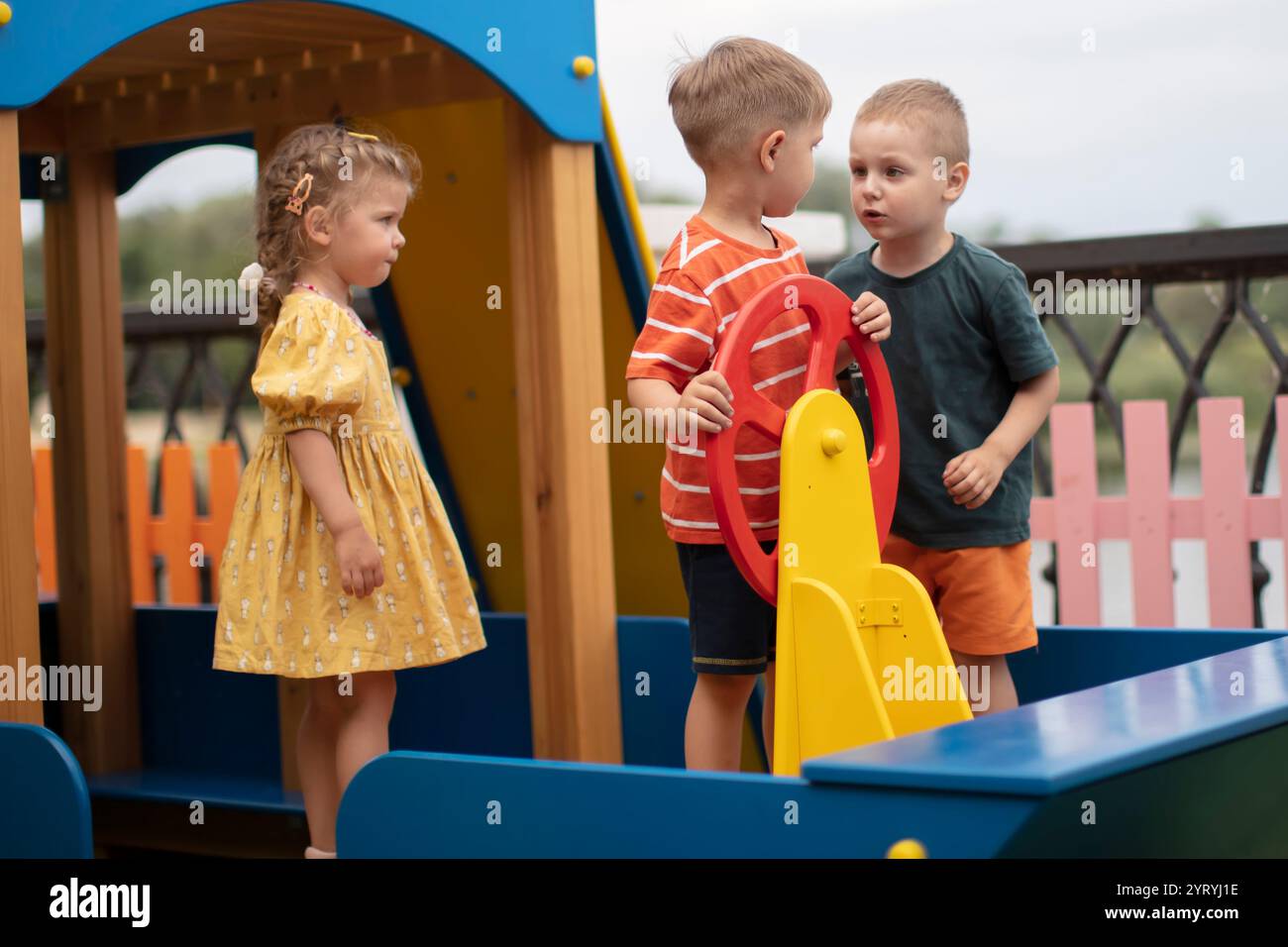 Conflict in young children. Three kids swear and argue in children's ...