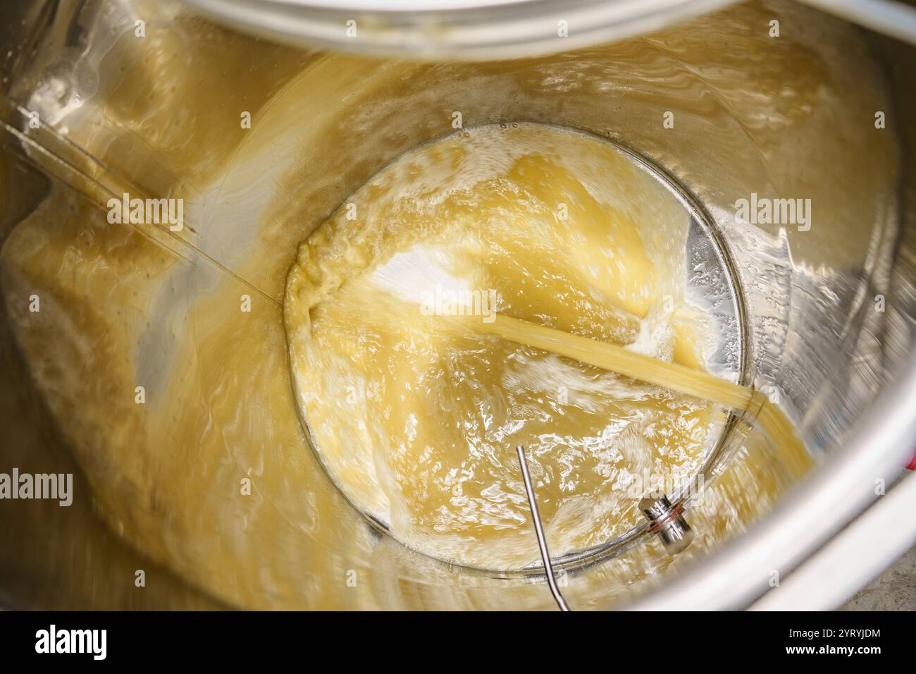 freshly pressed grape juice in stainless steel tank for wine making ...
