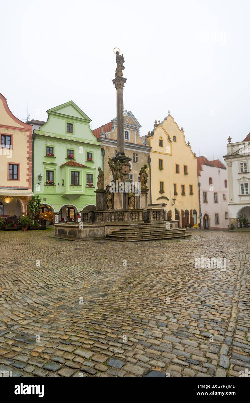 A moody autumn view of the square in Cesky Krumlov, featuring the ...