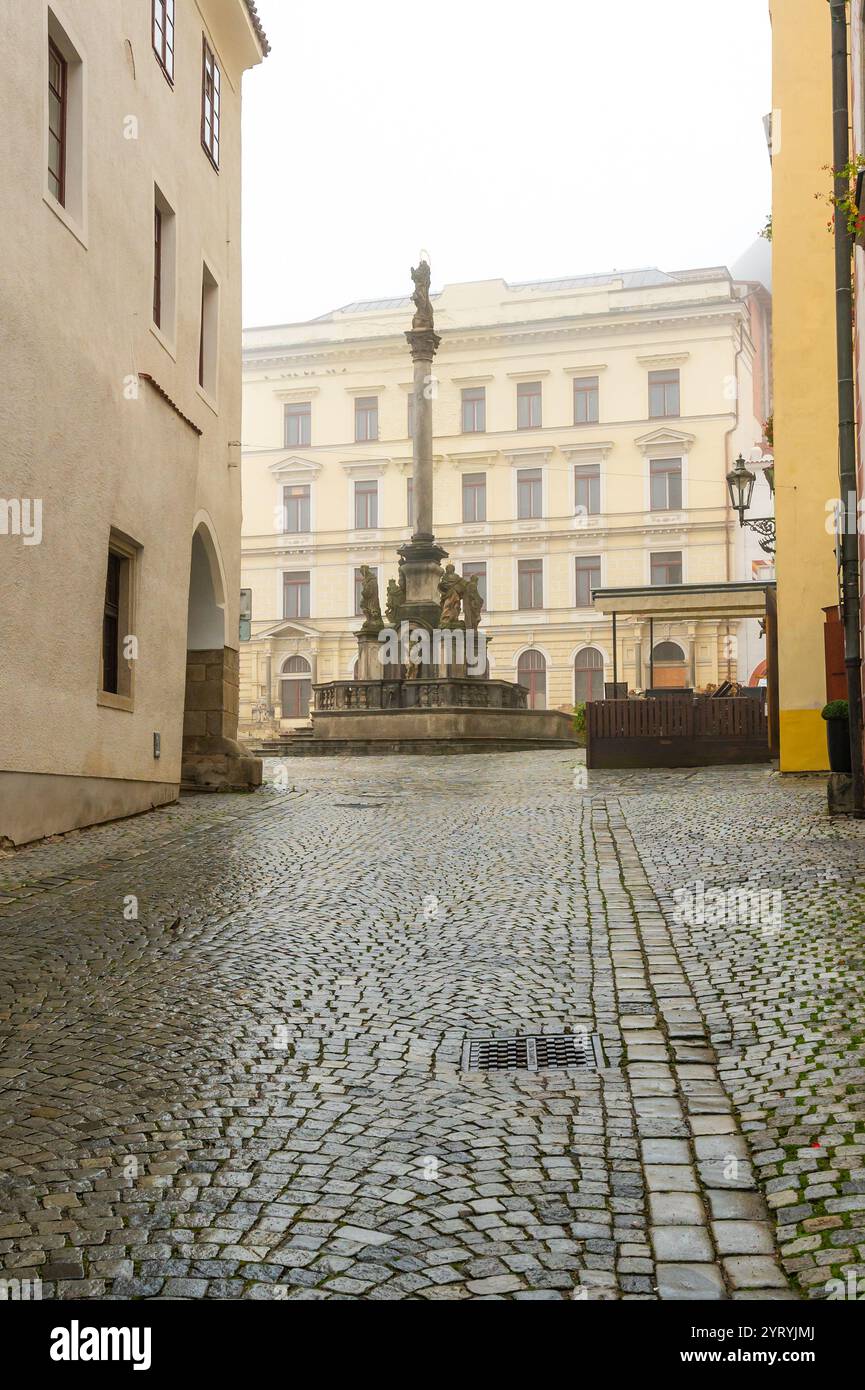 A moody autumn view of the square in Cesky Krumlov, featuring the ...