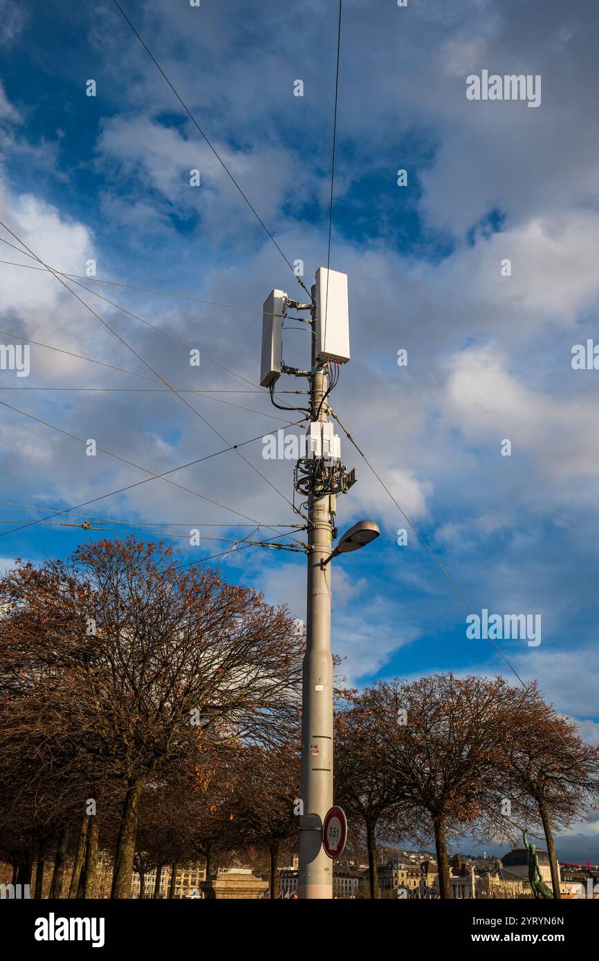 5G cell tower with signal repeaters. Wide-angle, looking up shot, no ...