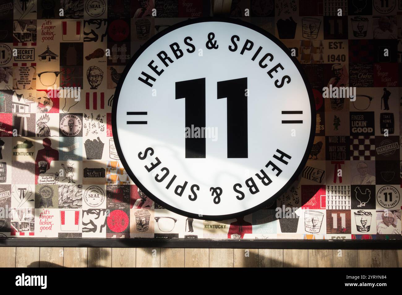 Closeup of KFC 11 Herbs and Spices sign in a KFC outlet in west London, England, UK Stock Photo ...
