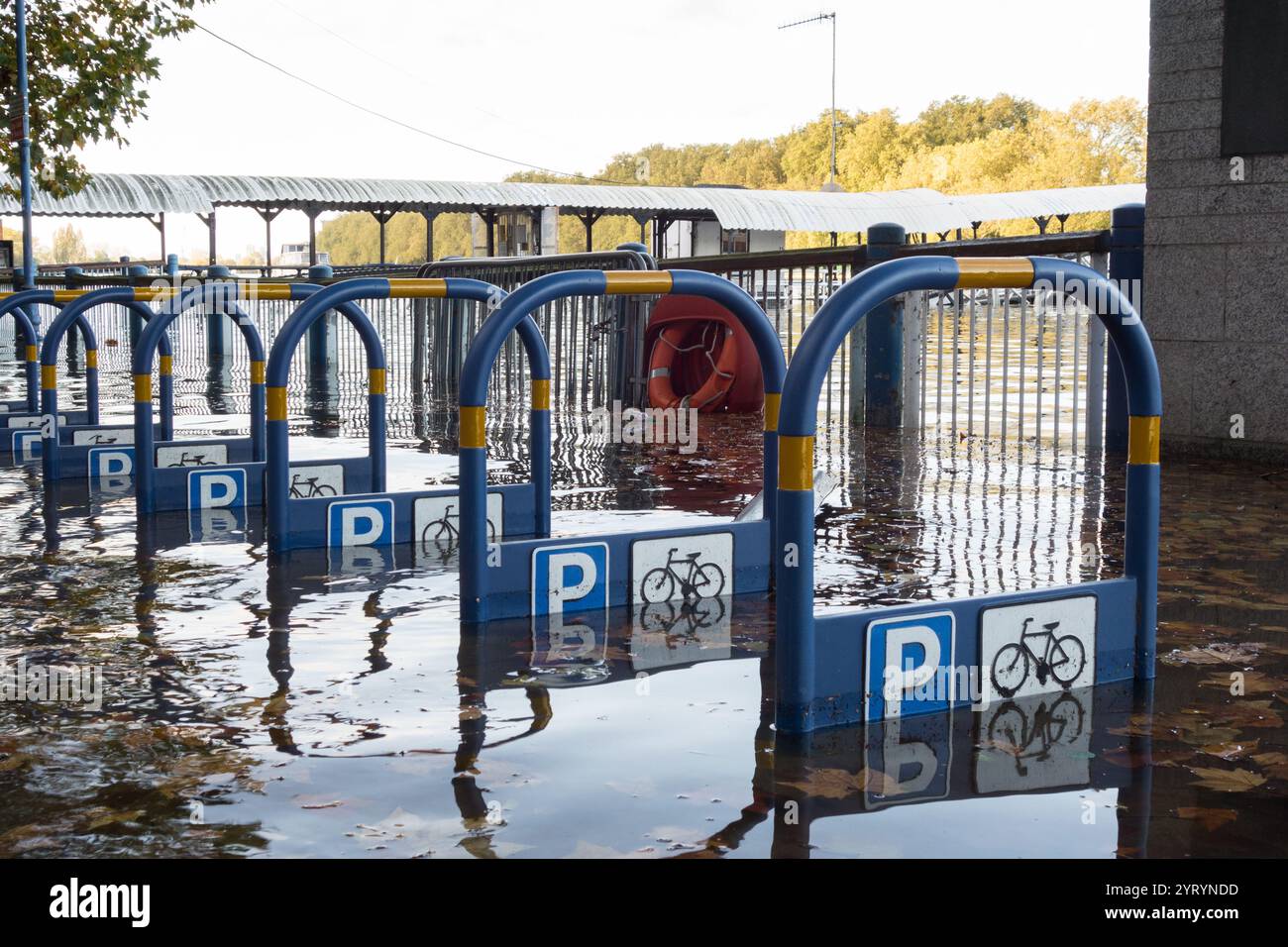 Submerged bicycle stands after a supermoon high water flood on the ...