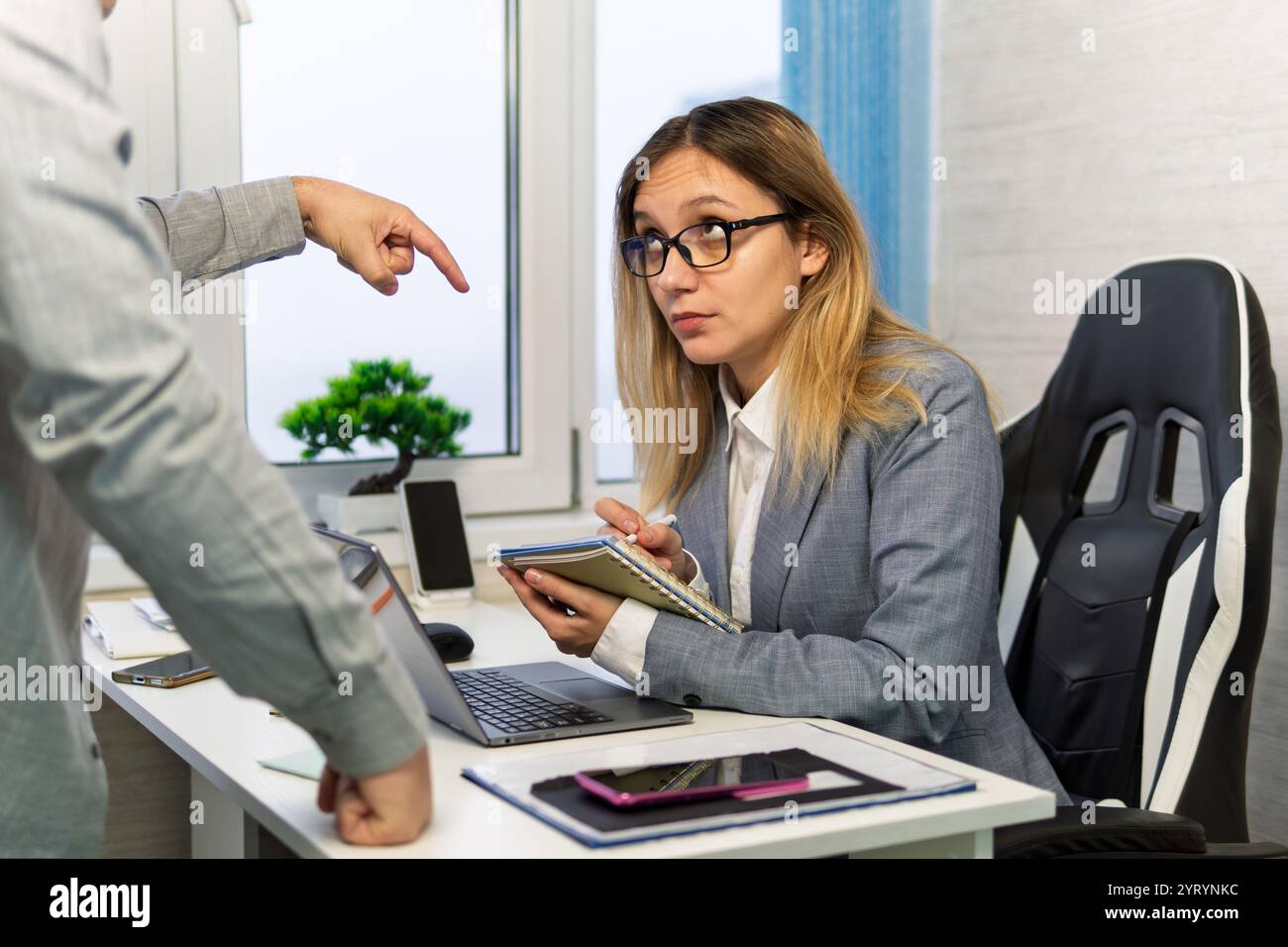 Stress businesswomen suit with boss pointing finger yelling reprove ...