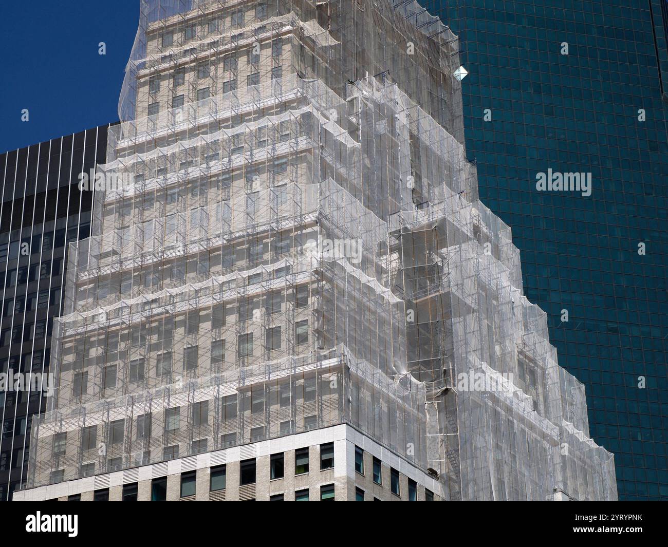 A Skyscraper under restoration renovation in New York City Stock Photo ...